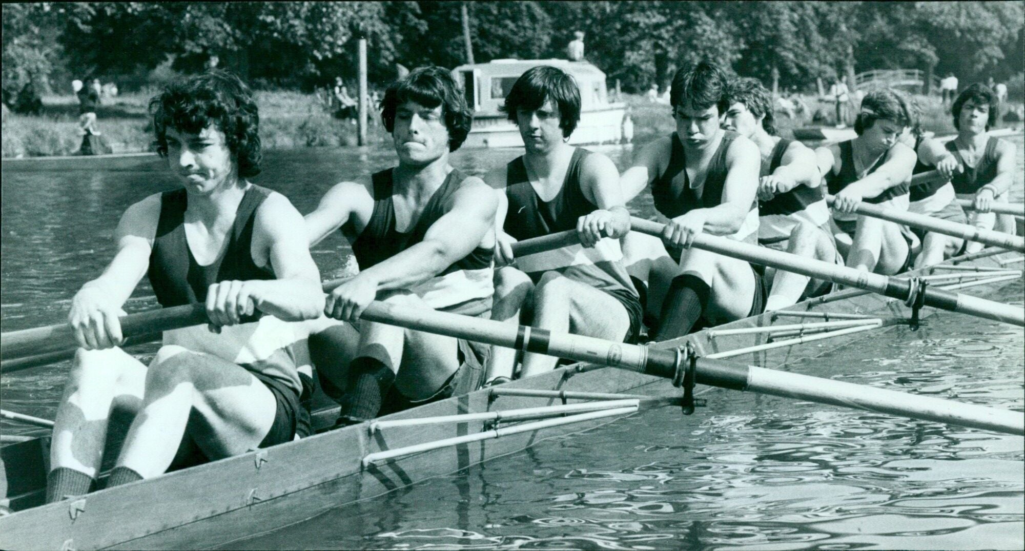 Oxford City rowing team celebrates with their trophy after winning the