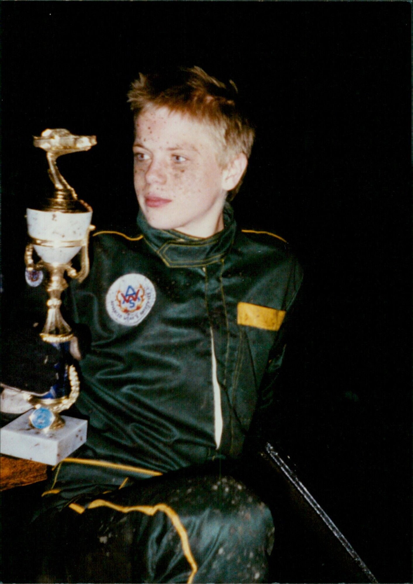 Professional race car driver Kevin Banks posing with his third-place t