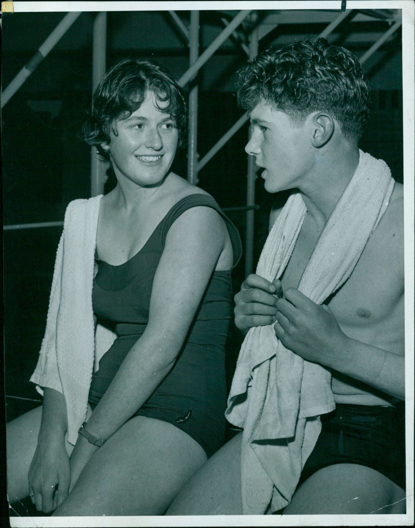Miss P. Pitt and other successful swimmers congratulate Miss D. Day on