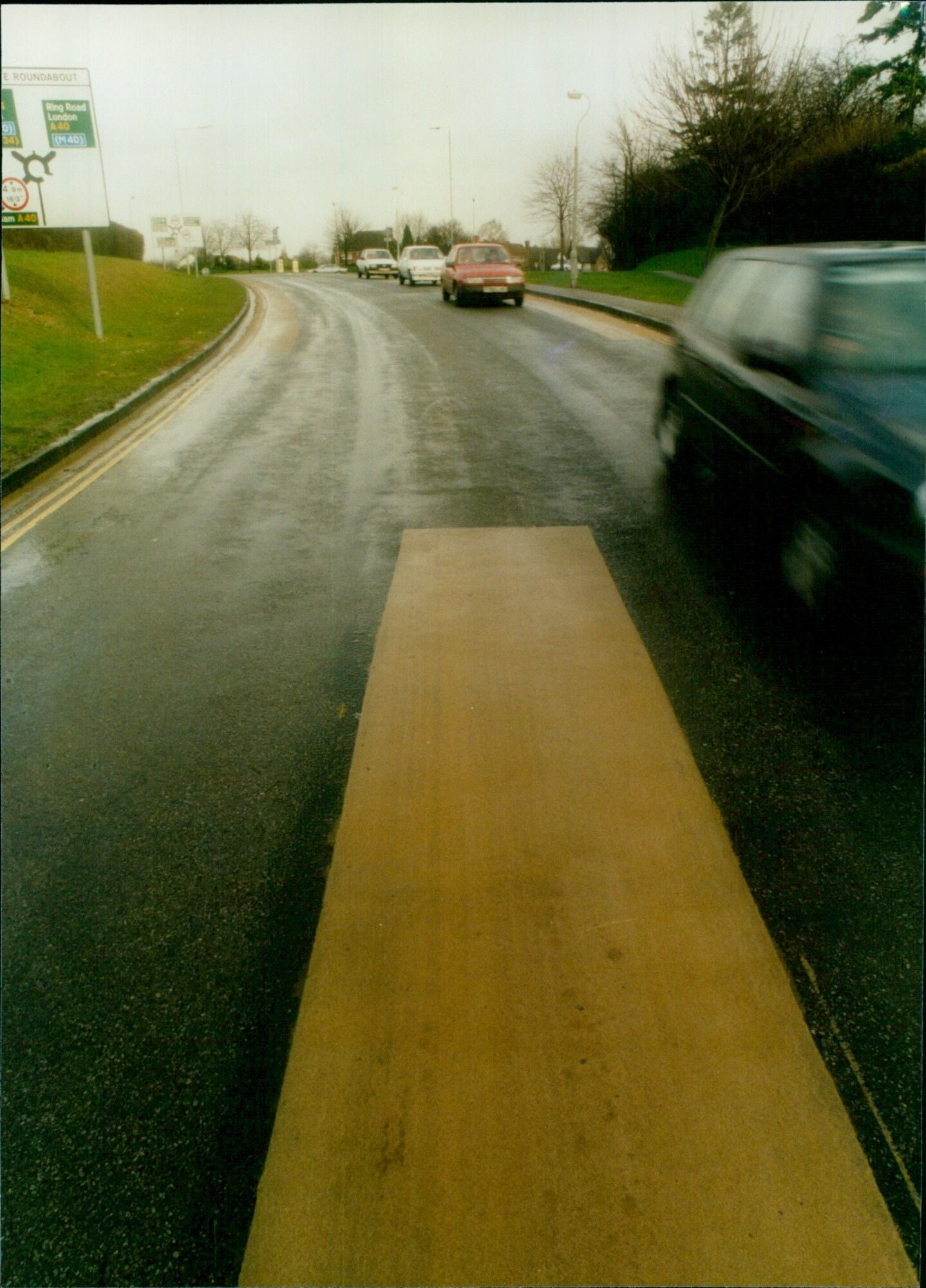 Traffic calming road markings on the A40 Ring Road in London. - Vintag