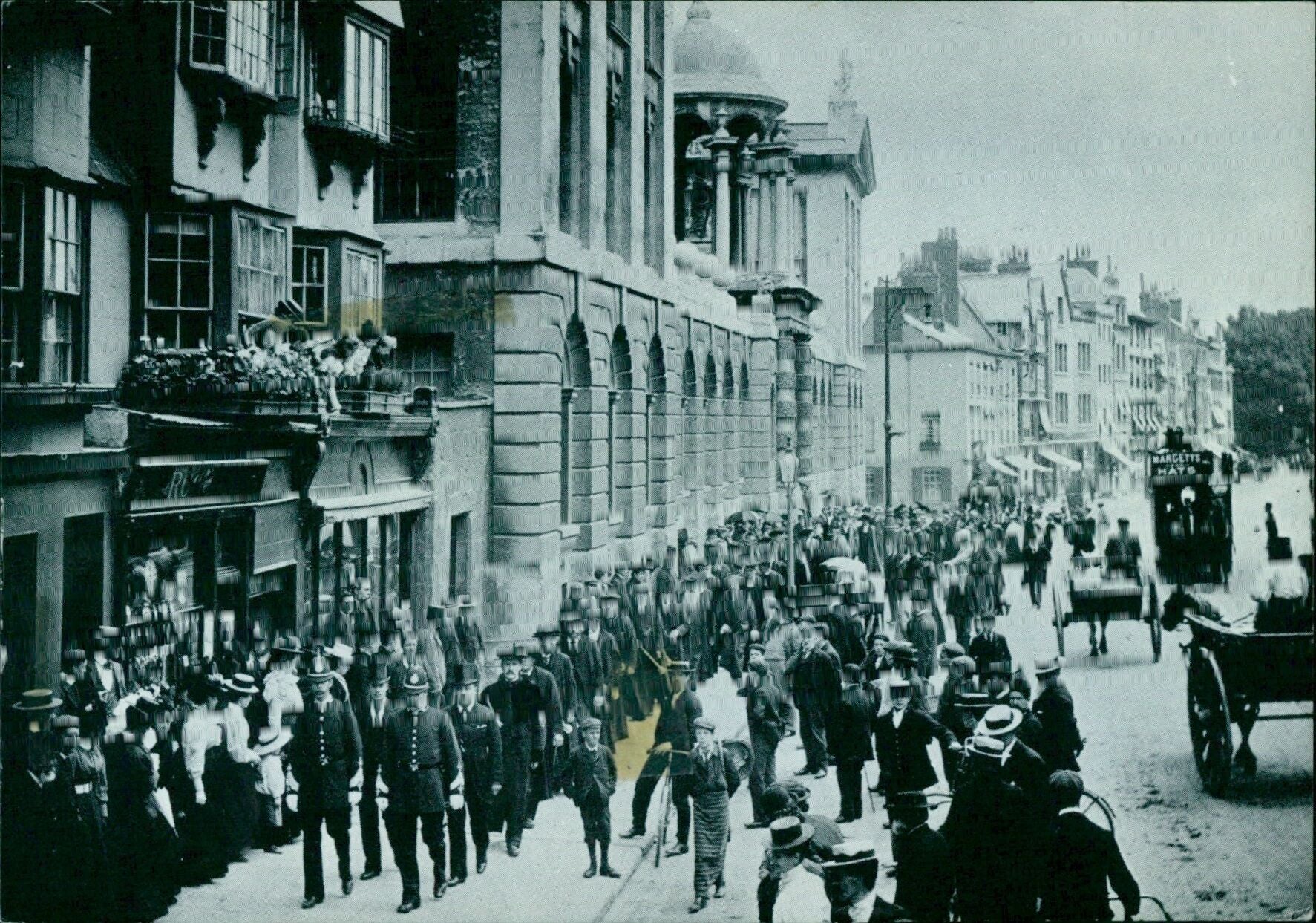 Members of the Encaenia procession leaving Queen's College in Oxford,