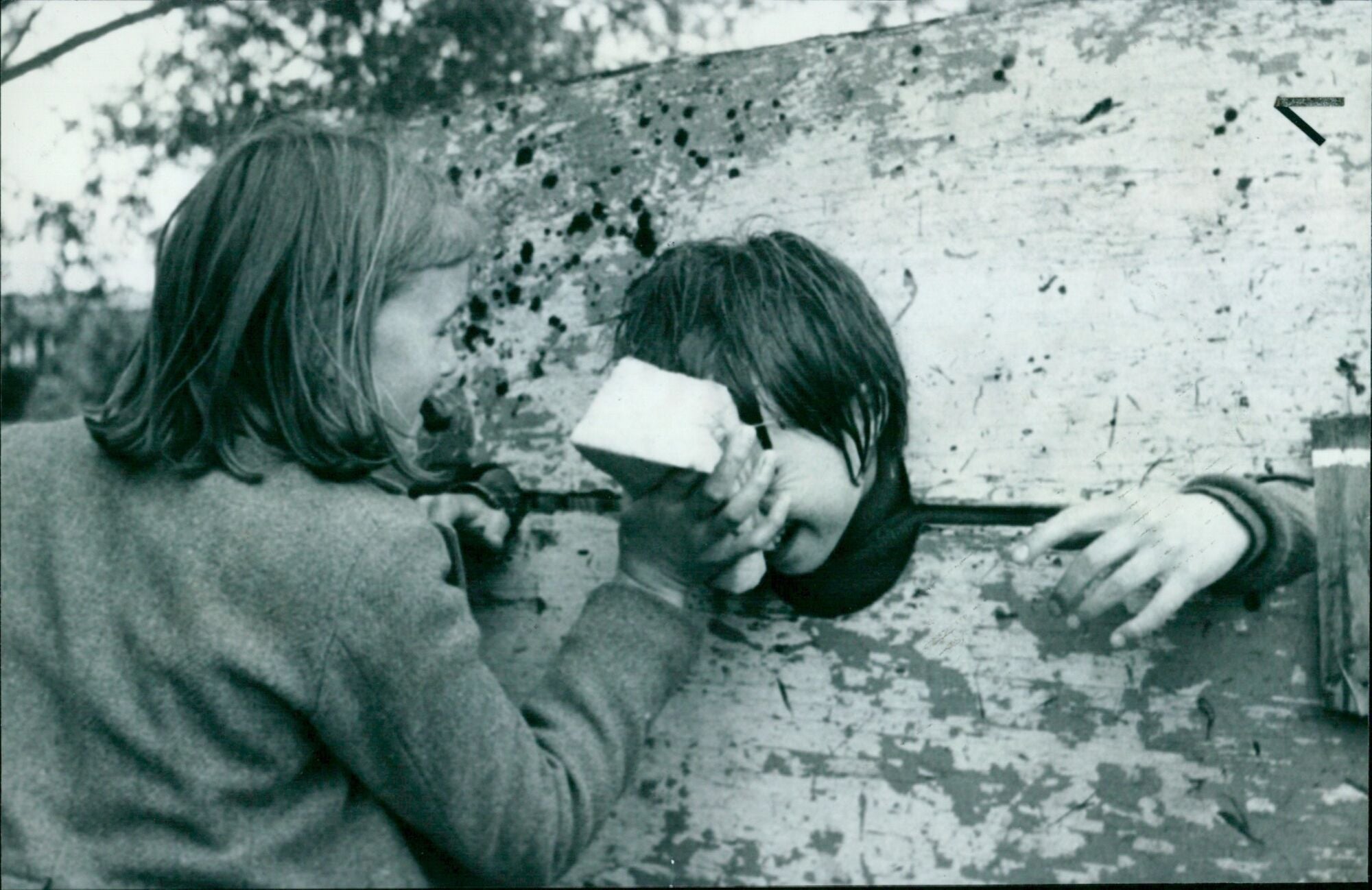A military fighter jet dropping bombs during a training exercise. - Vi