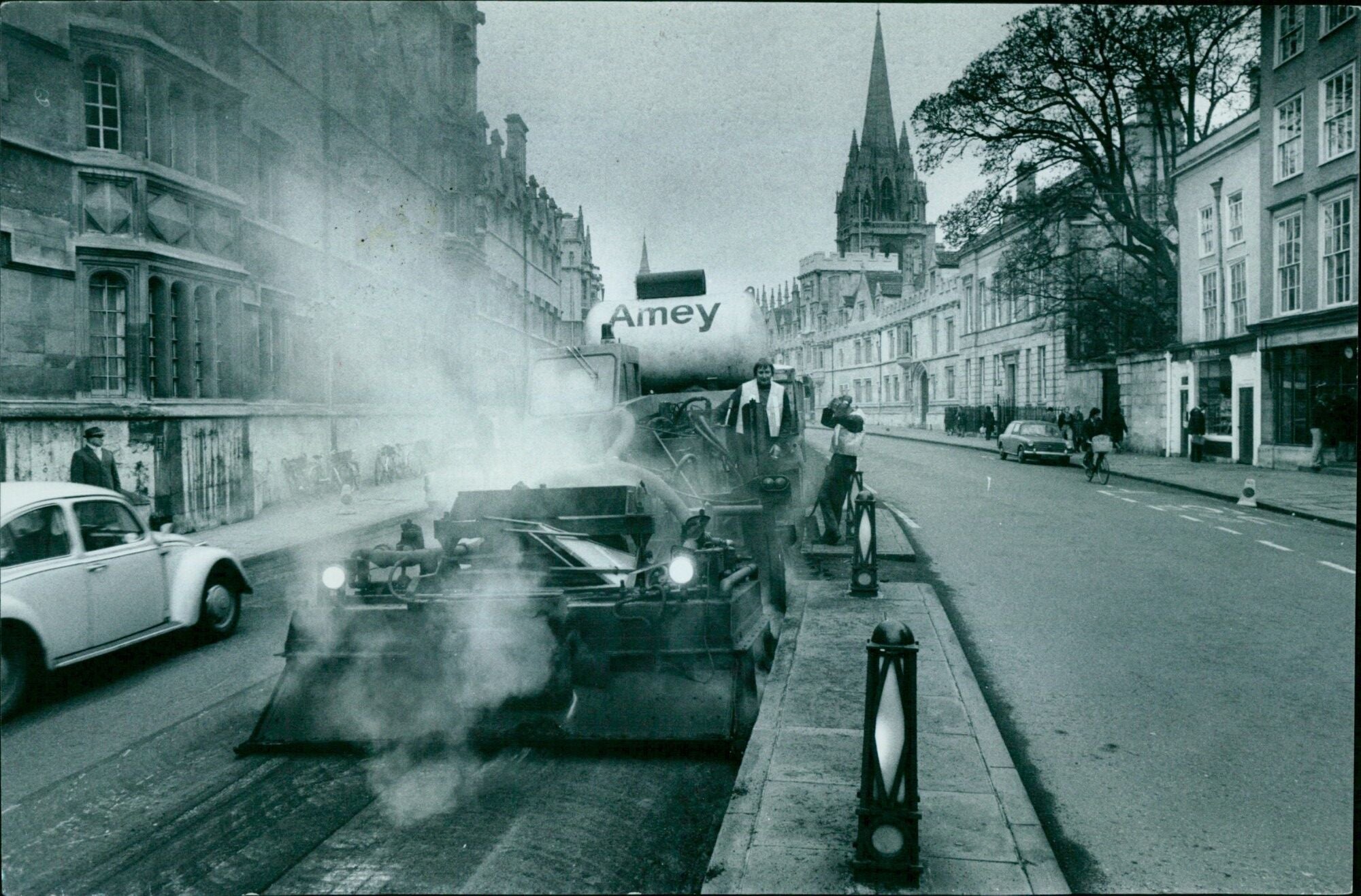 Workers resurface High Street in the town of Jage, Germany. - Vintage