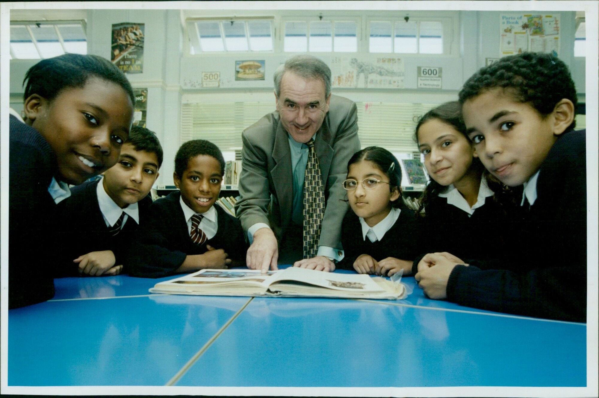 Martin Thomas, headteacher of Temple Cowley School, poses with student