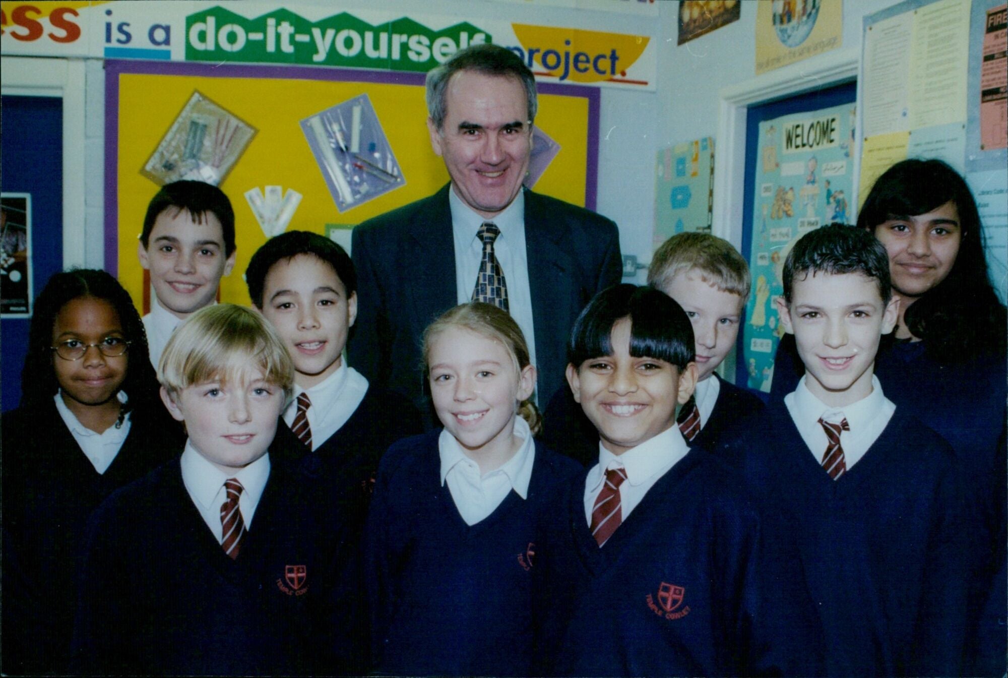 Mr. Mauten Themas, a headmaster of Temple Coury Temple School, poses w