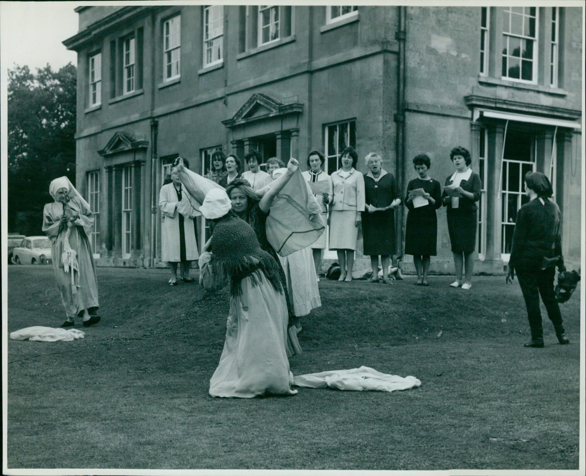 Students at Denman College watch a TV show in the evening. - Vintage P