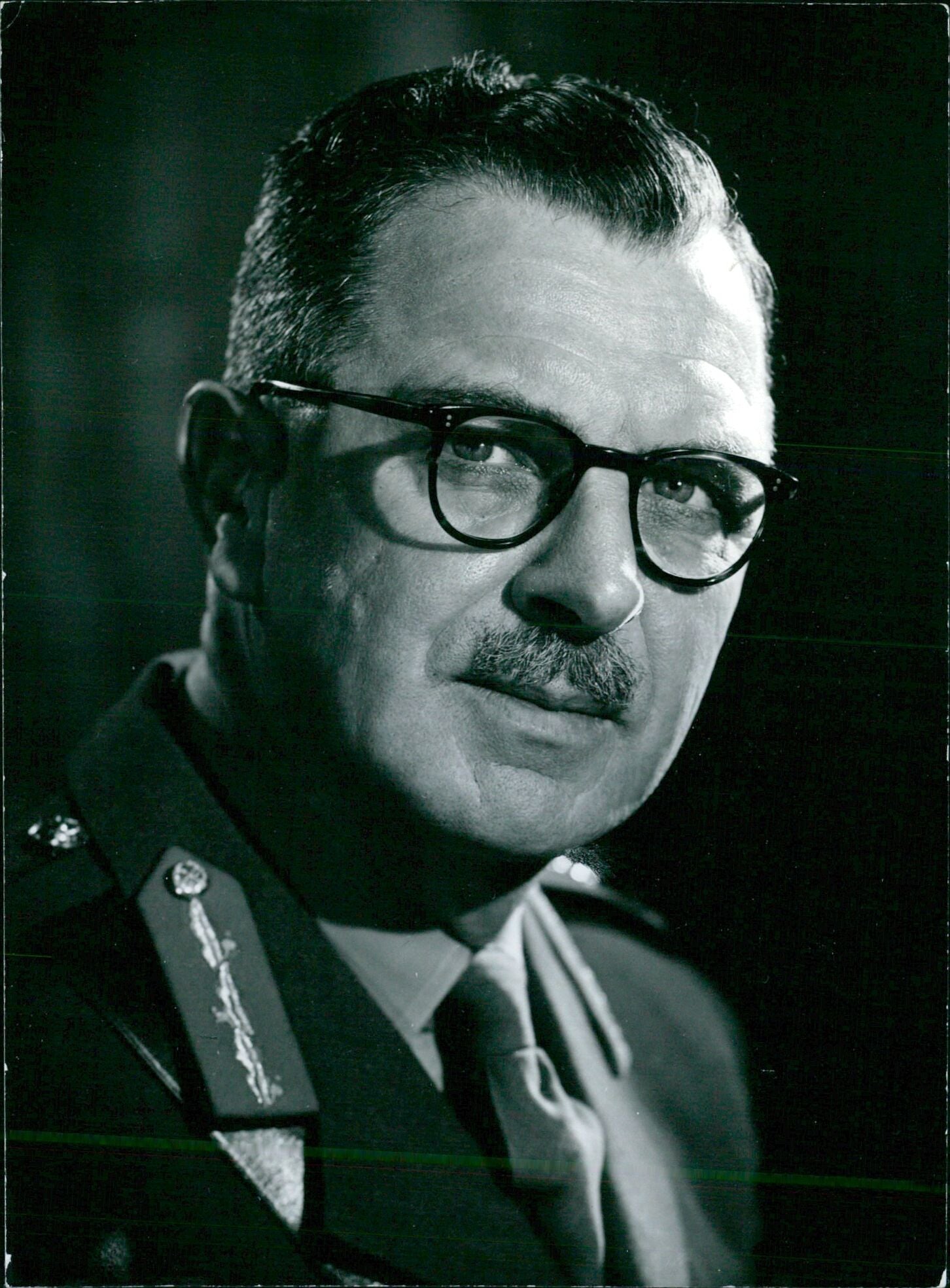Major General Alfred Gadd, Director of Army Education, poses for a por