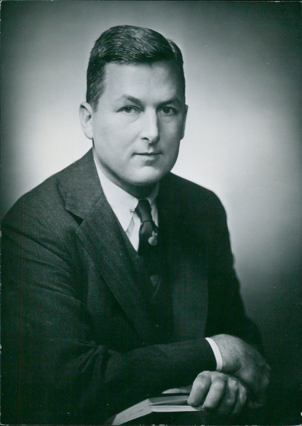 Dr. Nathan M. Pusey, President of Harvard University, poses for a port