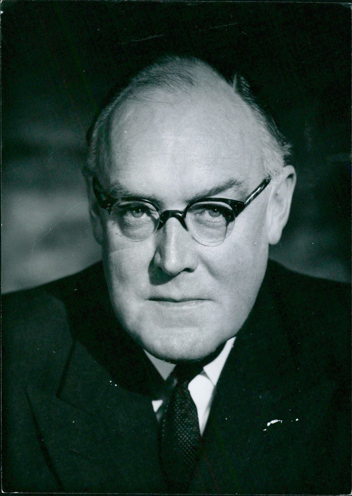 British businessmen Lord Geddes (centre) poses with colleagues at the