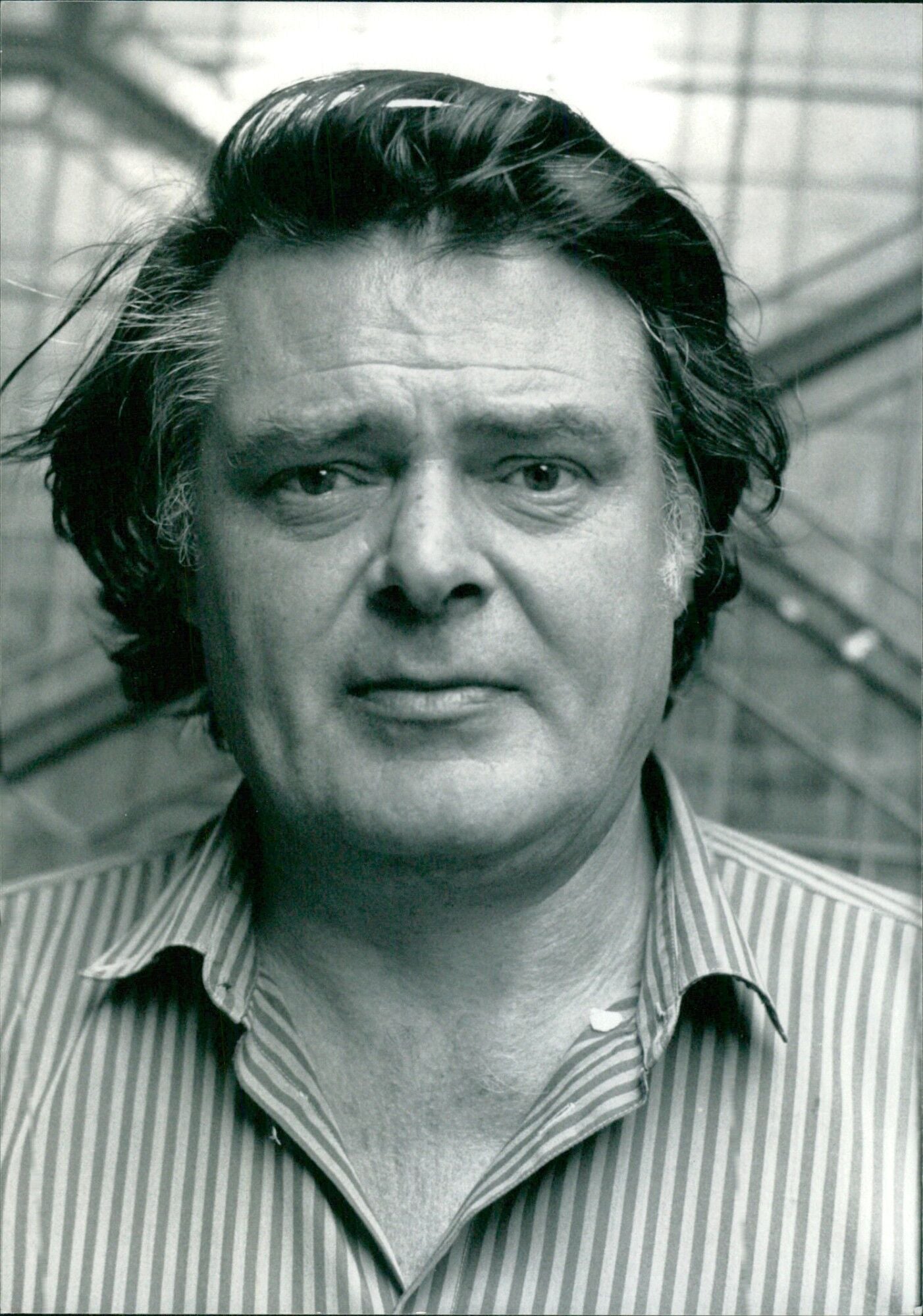 British playwright and author Simon Gray poses for a photograph in 198