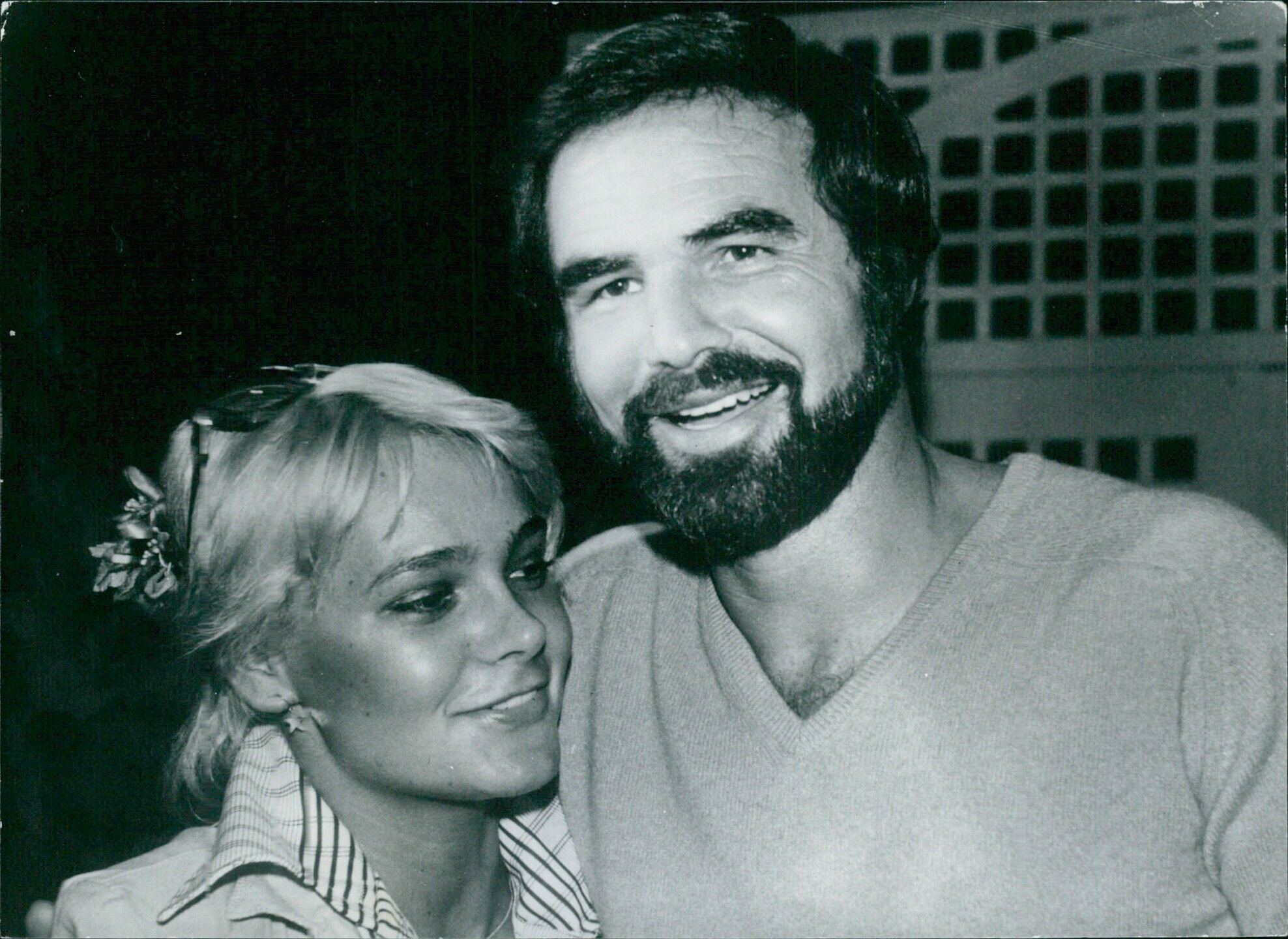 Actor Burt Reynolds poses with devoted fan Lola Nelson, 23, a former