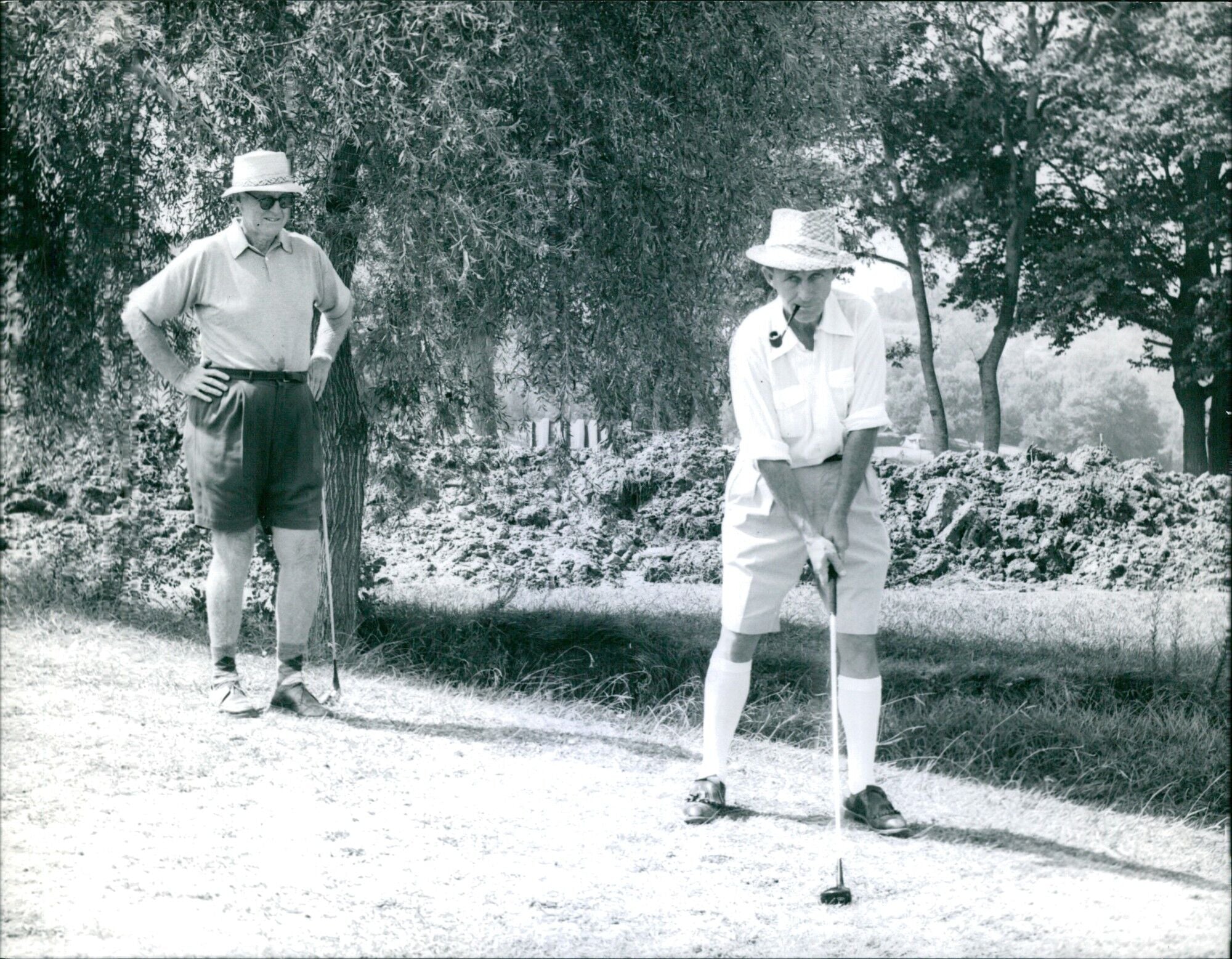 Bing Crosby and Joseph Kennedy, Sr. enjoy a friendly game of golf toge