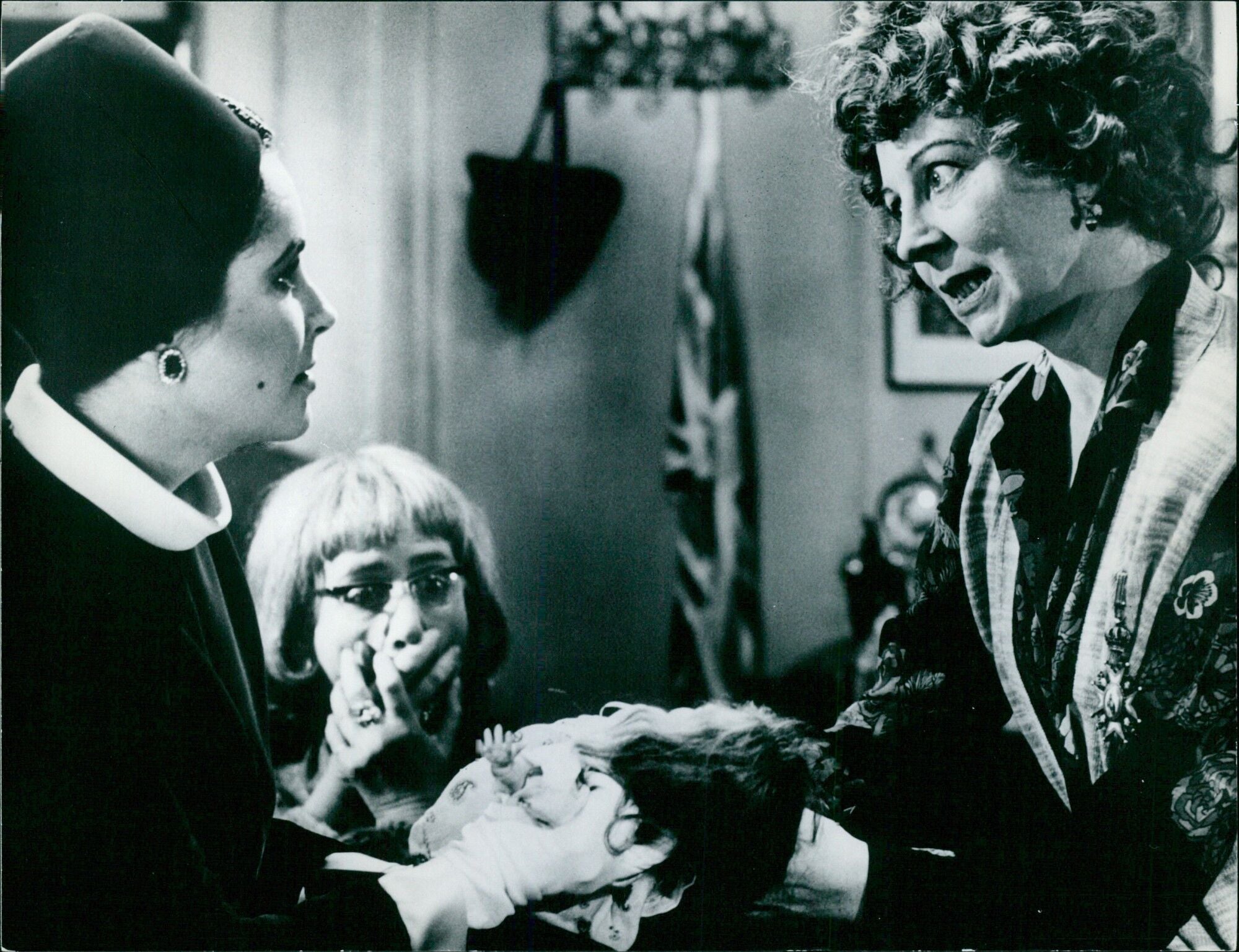 Elizabeth Taylor, Mia Farrow, Robert Mitchum, Peggy Ashcroft, and Pame