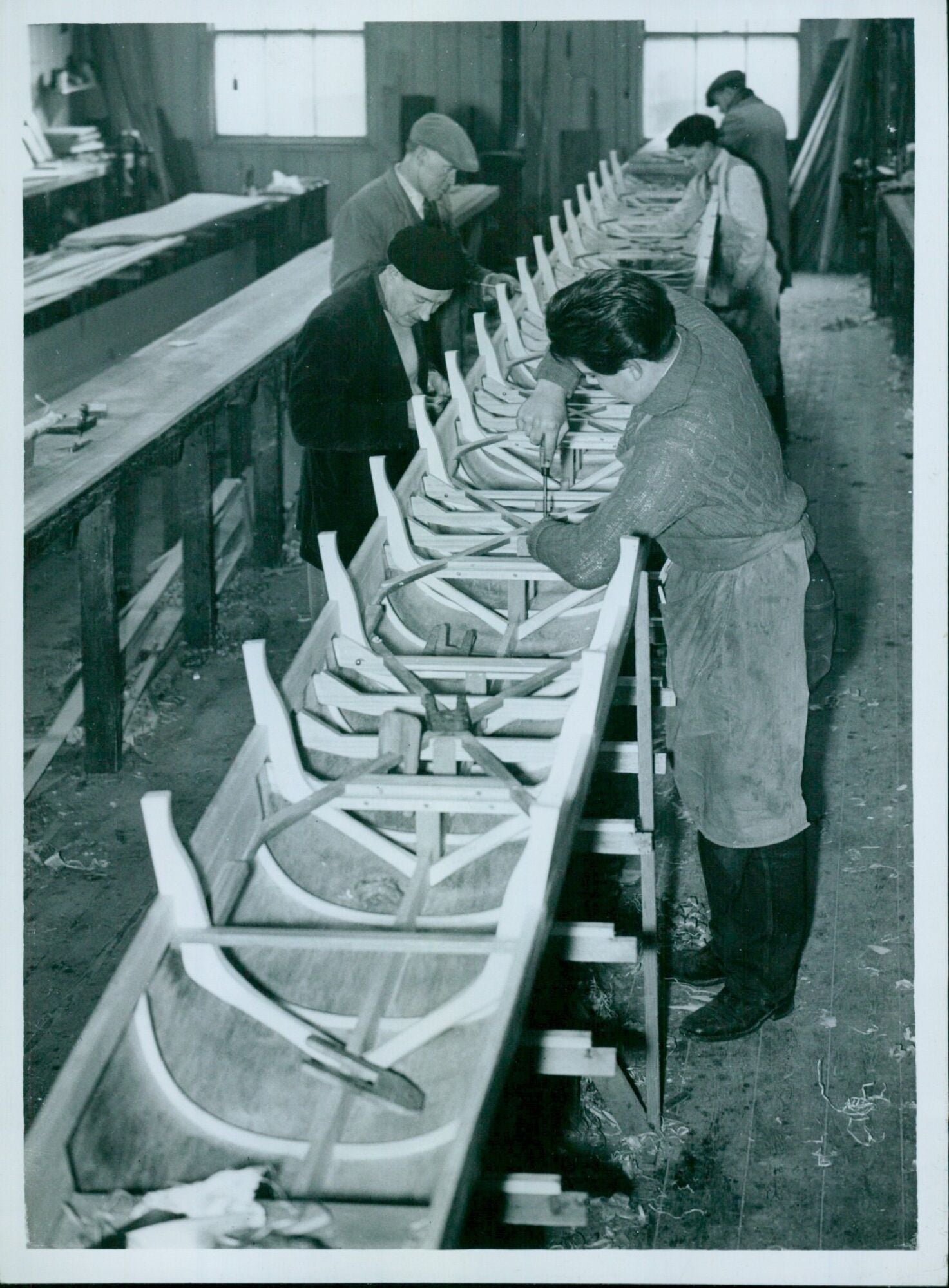 Boat builders, including Frank Sims, construct Oxford's new boat for t