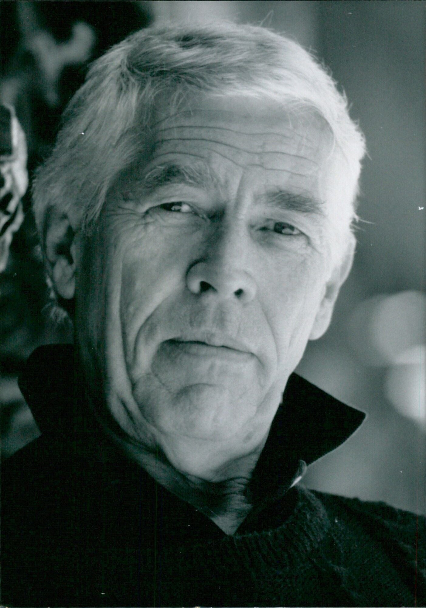 U.S. actor James Coburn poses for a portrait in 1988. - Vintage Photog