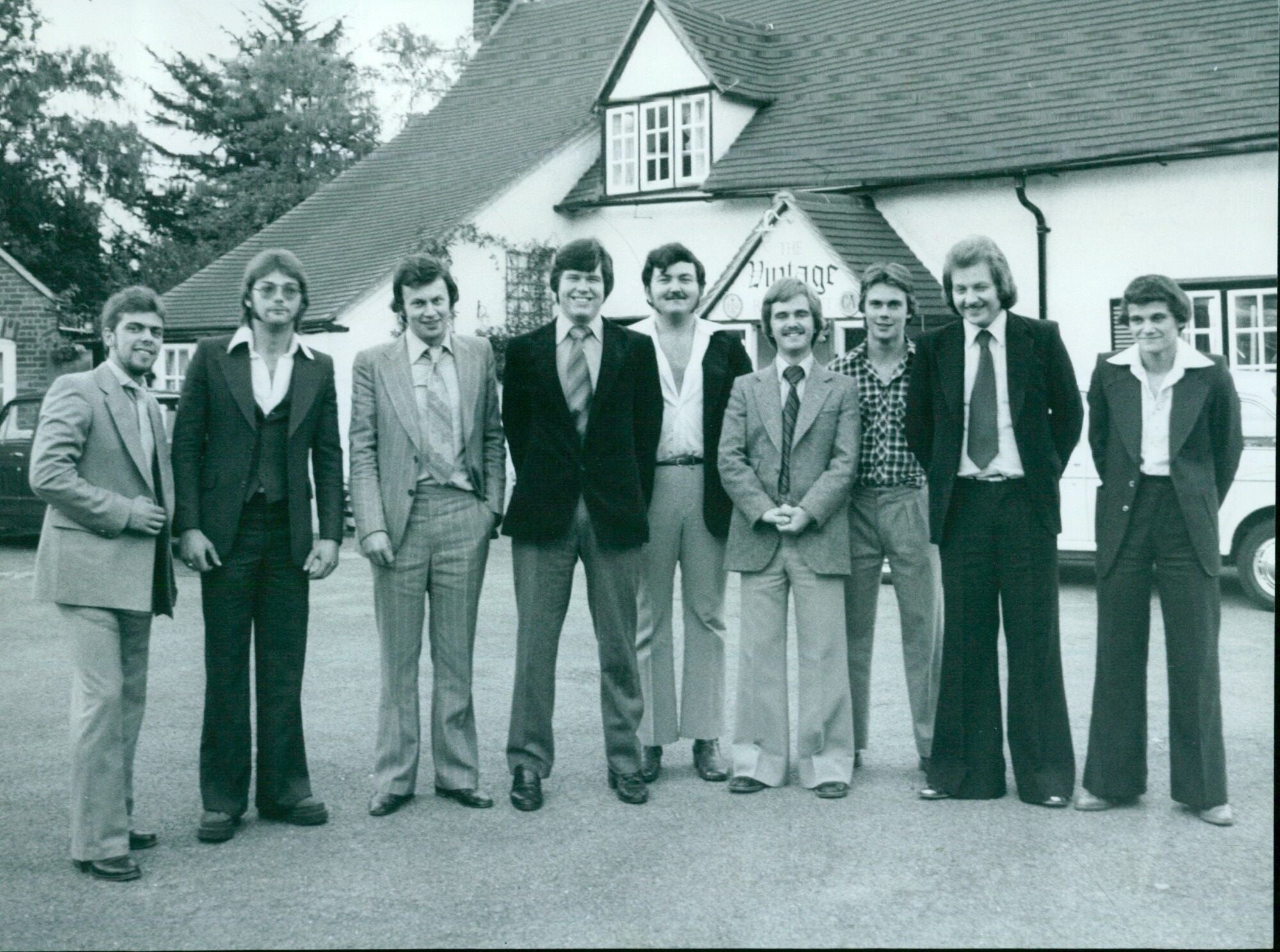 Nine apprentices from Hartwells of Oxford pose with their City and Gui