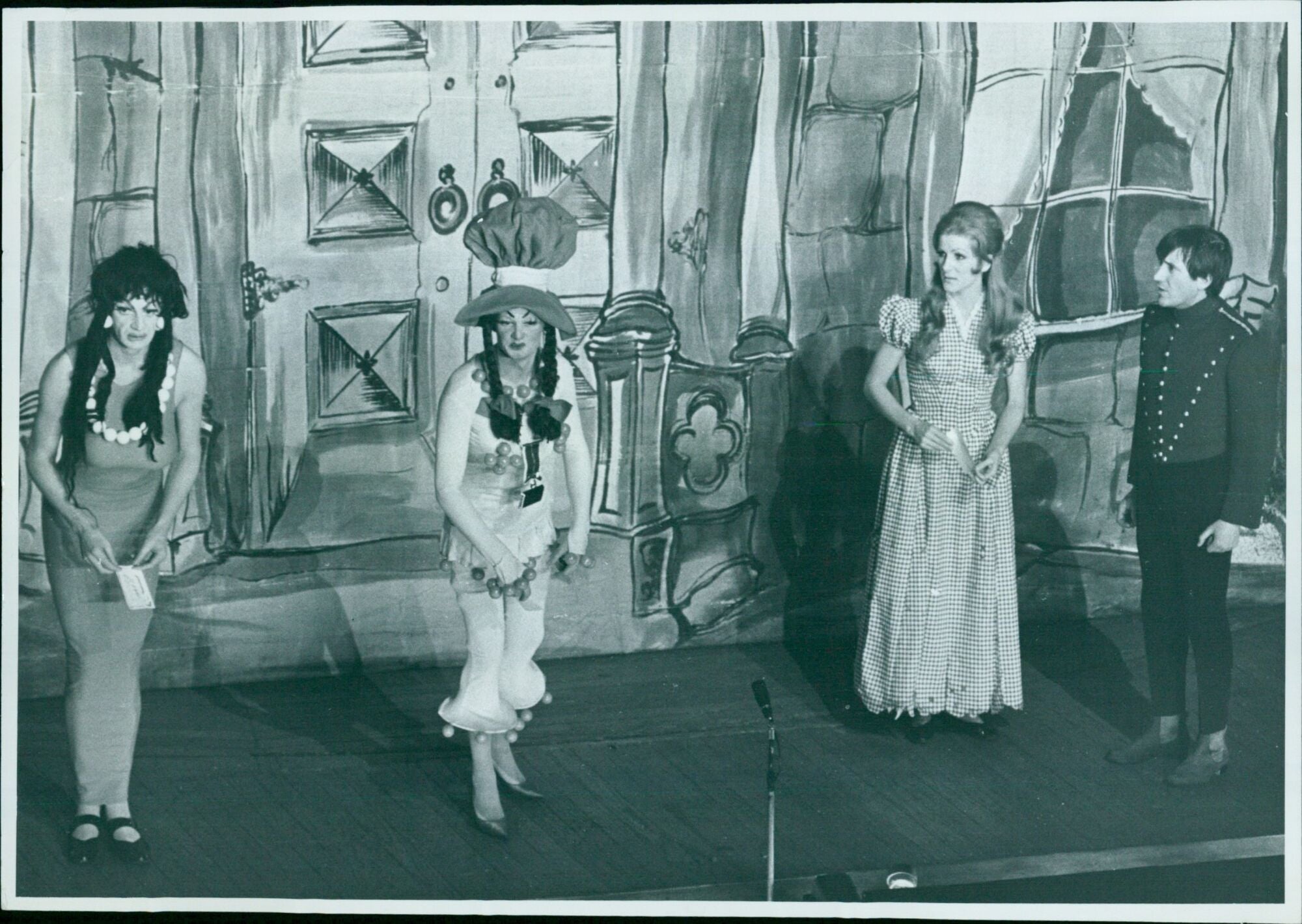 Barry Howard, John Inman, Jenny Wren, and Roy Coutle perform in the Ne