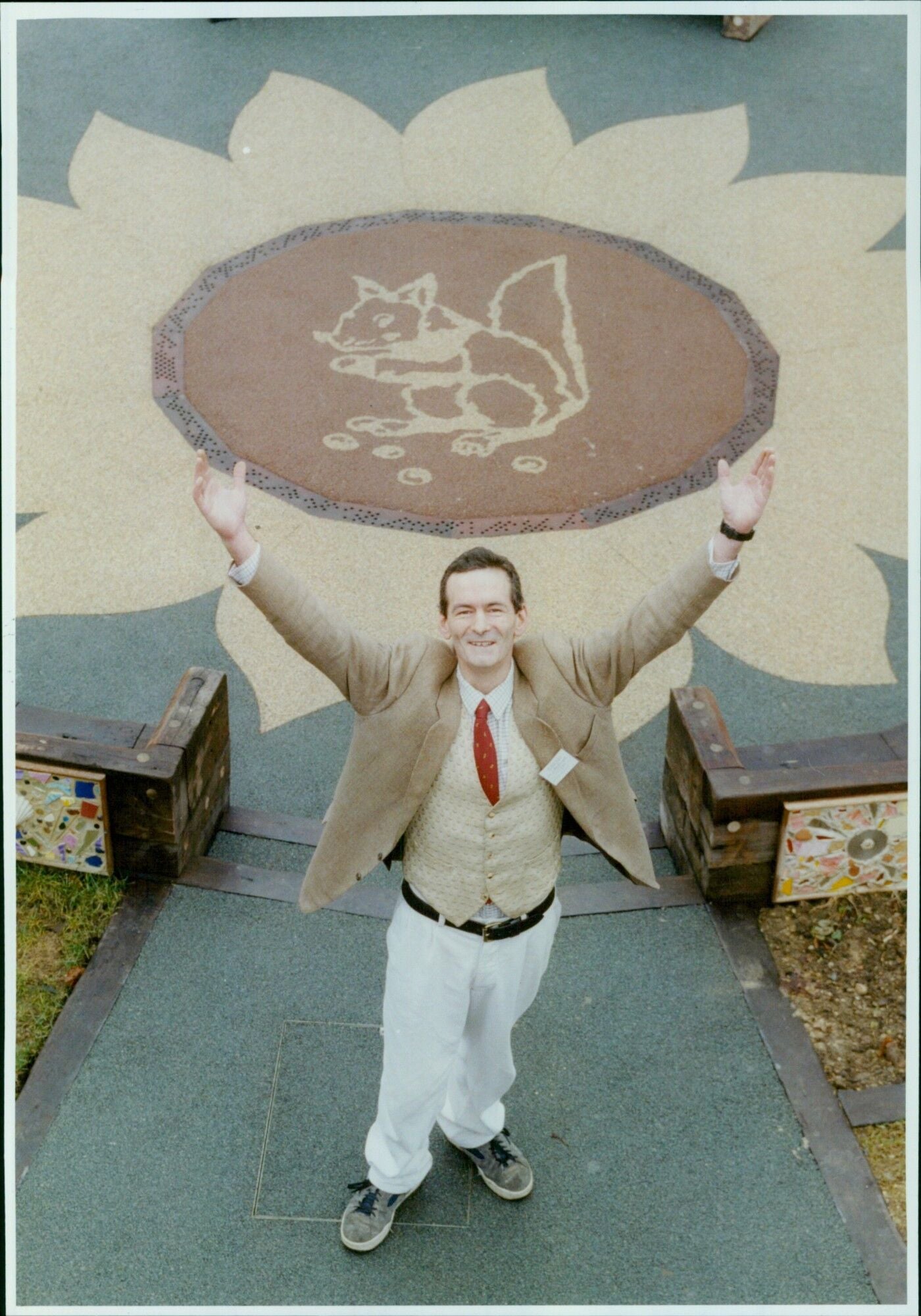 Landscape artist John Keyes creates a garden at Greycote School. - Vin