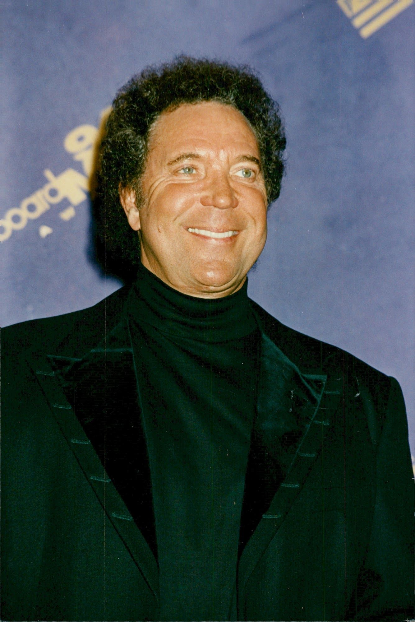 Portrait image of Tom Jones taken in conjunction with the Billboard Mu