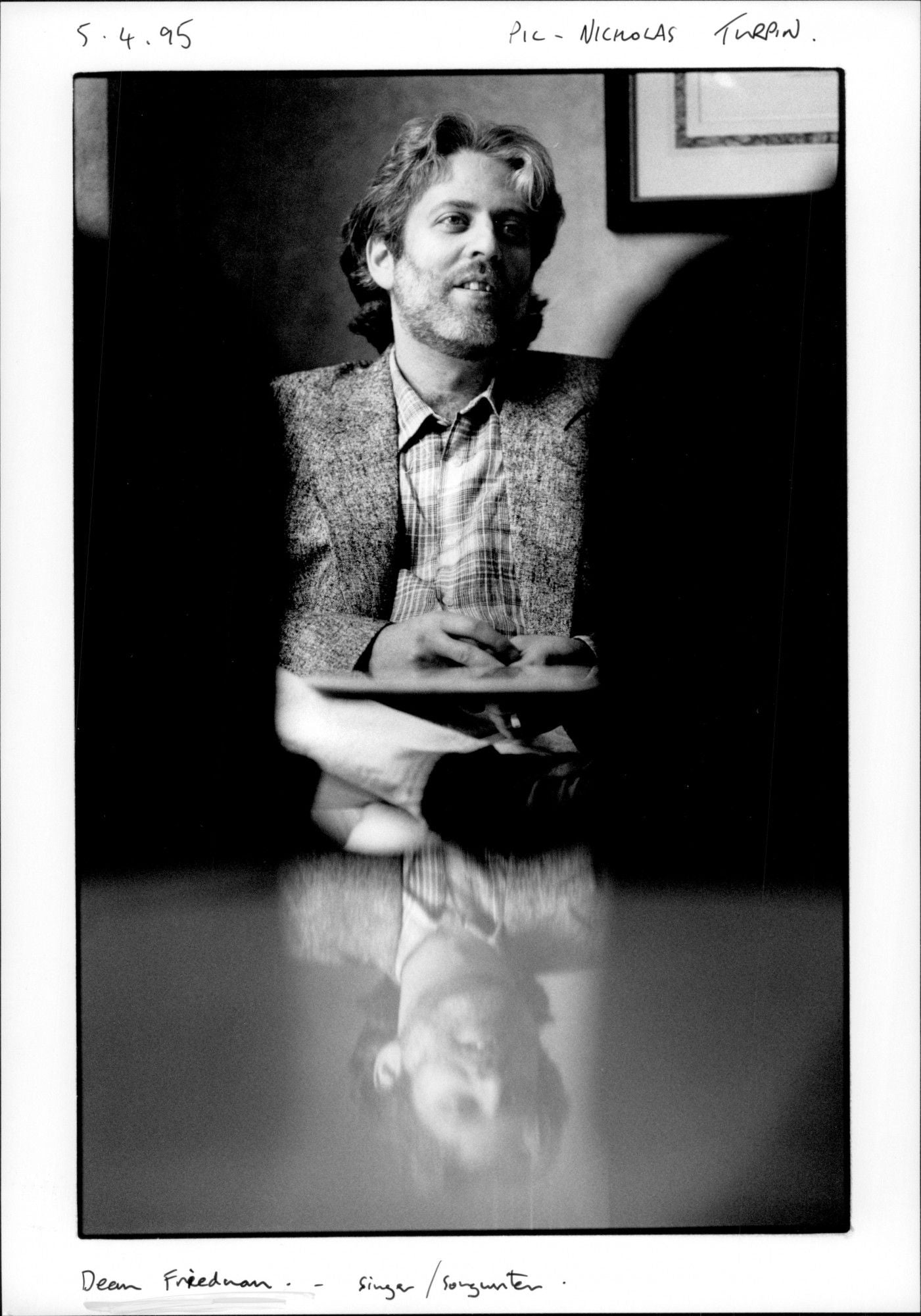 Portrait of American singer-songwriter Dean Friedman while smiling - V